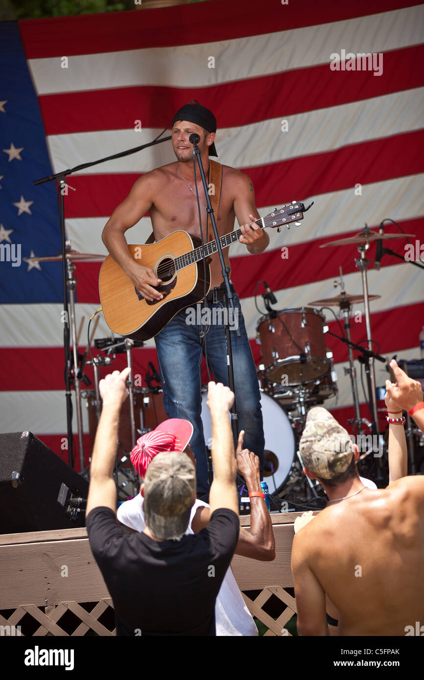 A southern rock band plays during the annual Summer Redneck Games ...