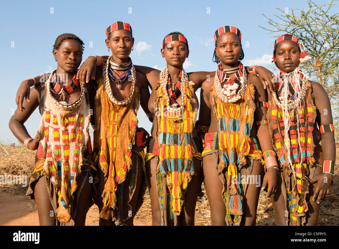 A group of Hamer tribeswomen at a village near Turmi in the Lower Omo ...