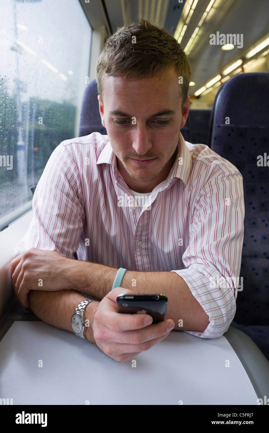 Mobile phone train journey uk hi-res stock photography and images - Alamy