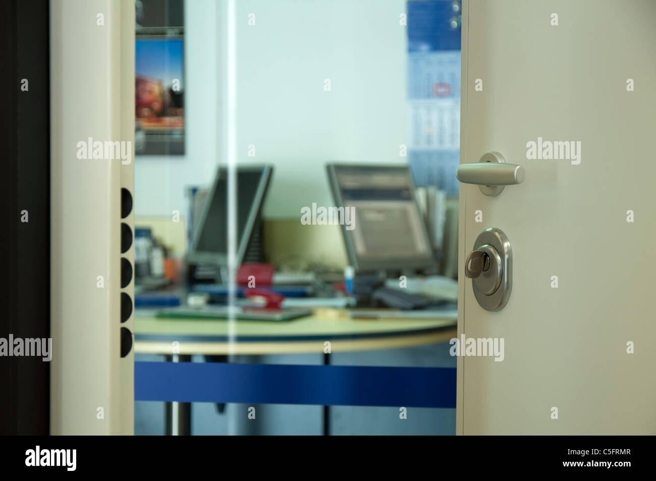 Open door in office. Horisontal image Stock Photo - Alamy