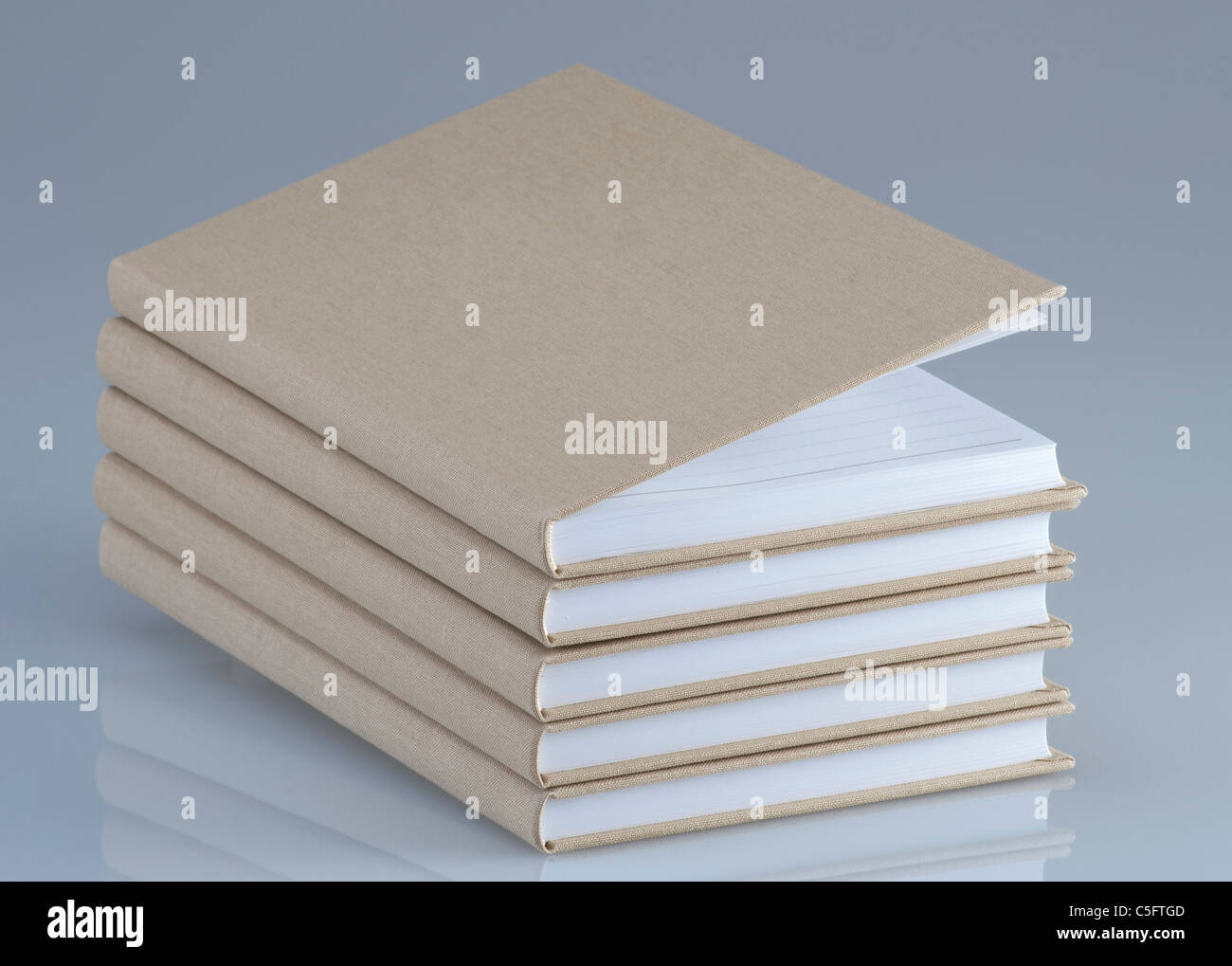 Five note books Stock Photo - Alamy