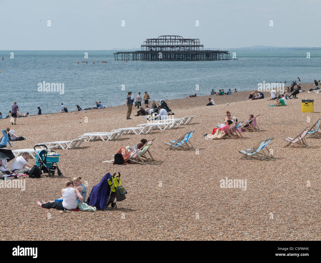 Sunbathers on the beach in brighton High Resolution Stock Photography ...