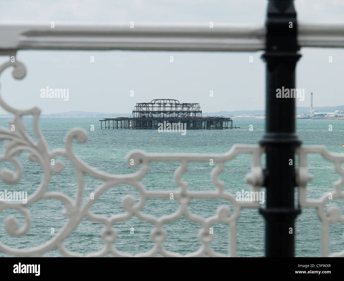 remains of burnt Brighton west pier seen from Brighton Marine Palace ...