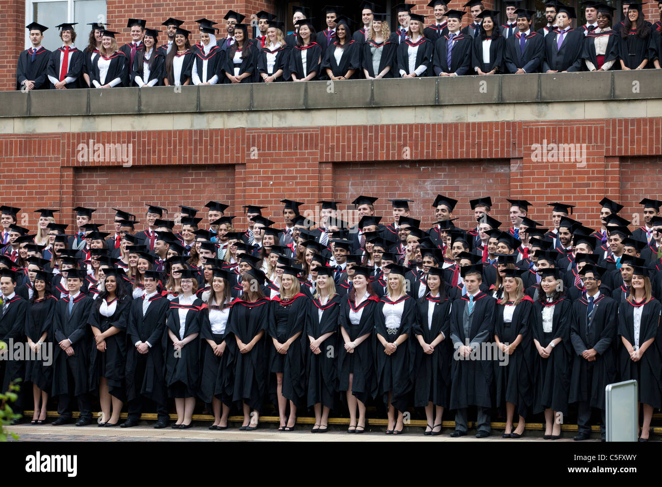 Graduates at University of Birmingham, England, UK line up for the ...