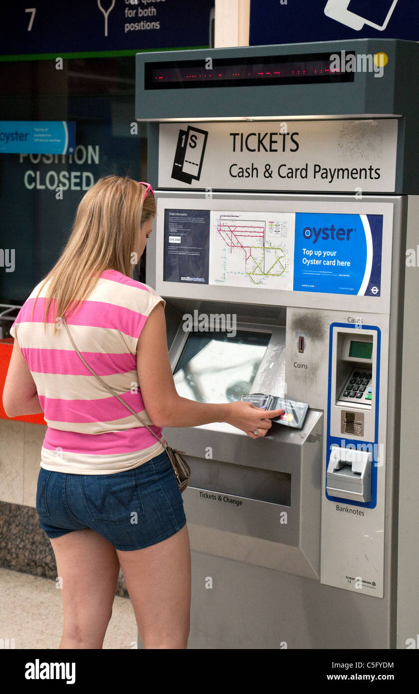 Teenager buying ticket hi-res stock photography and images - Alamy