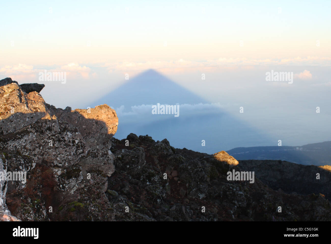 Sunrise at the top of Pico Island Azores with shadow Stock Photo - Alamy