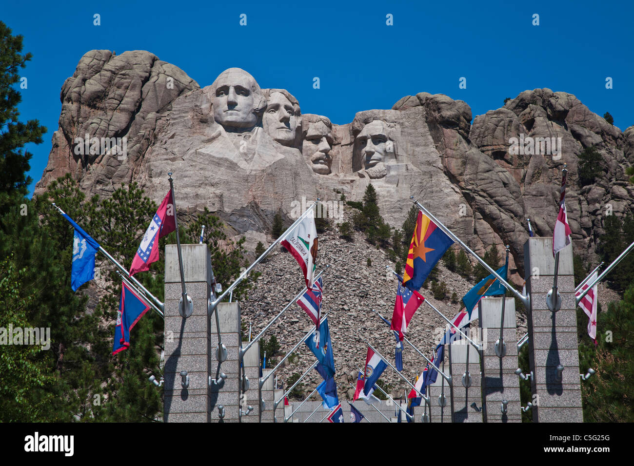 Mount Rushmore National Monument in South Dakota with flags lining ...