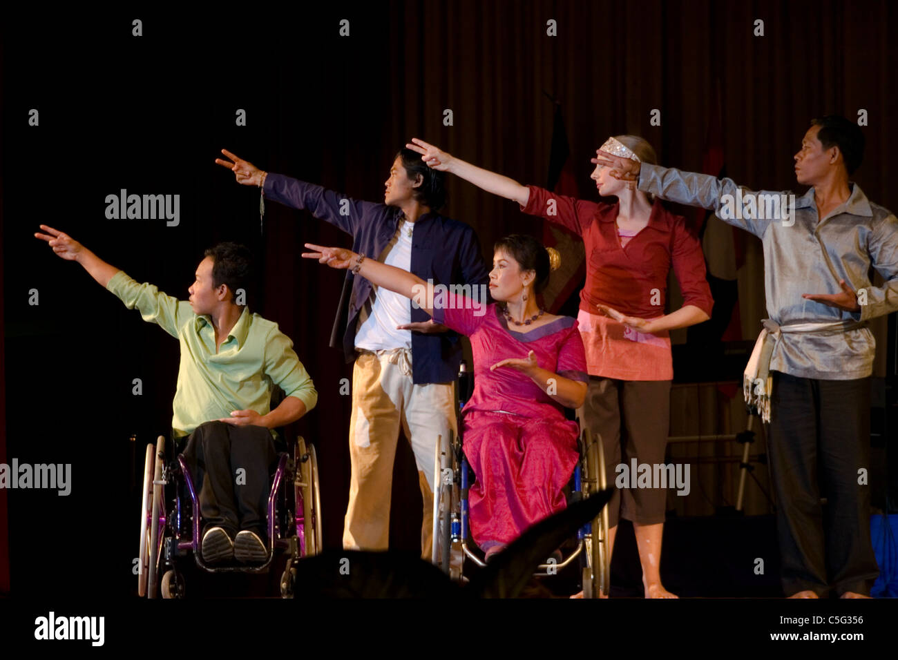 Disabled people are performing on a stage during a show marking ...