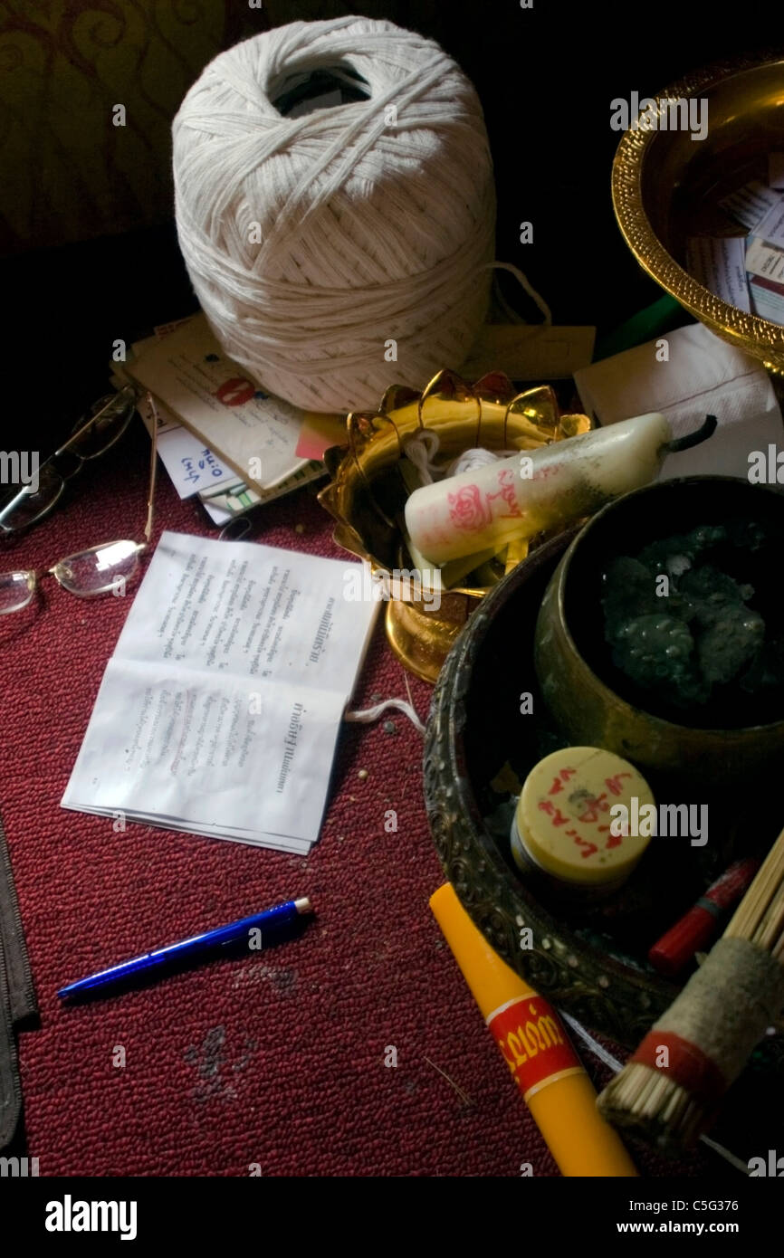 Reading glasses, a book and a ball of string are items among a monk's ...