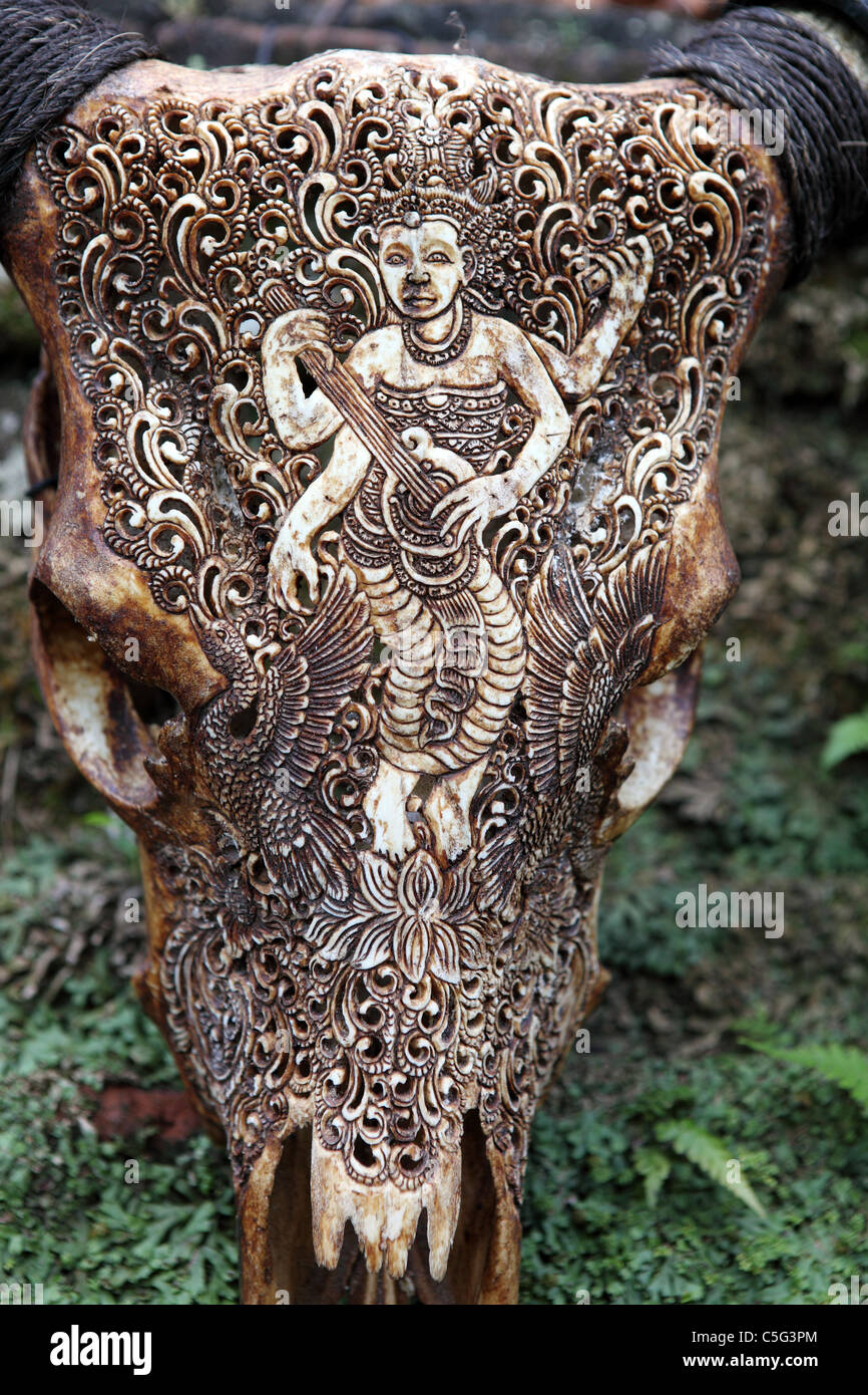 Intricately carved cattle skull. TampakSiring, Bali, Indonesia ...
