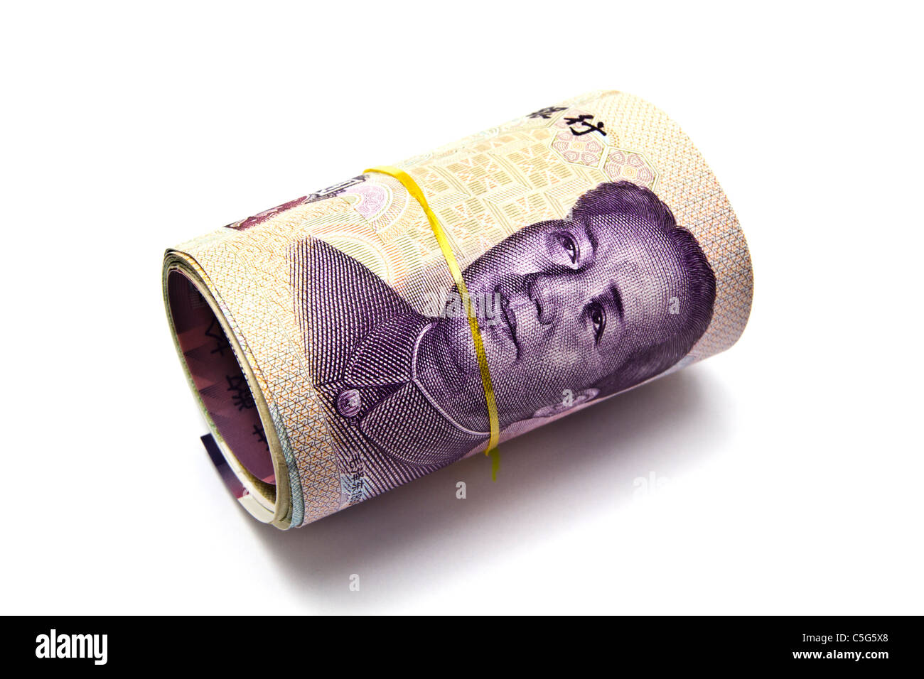 Roll of chinese money closeup on white background Stock Photo - Alamy