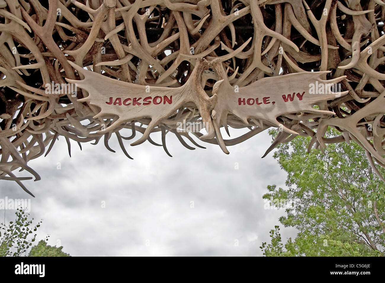 A young child exploring Jackson Hole's unusual Antler Gate Stock Photo ...