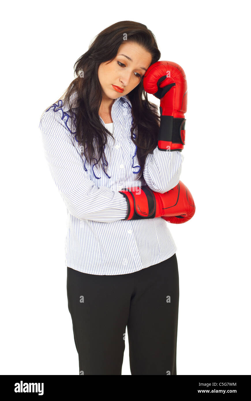 Pensive sad executive wearing boxing gloves isolated on white ...