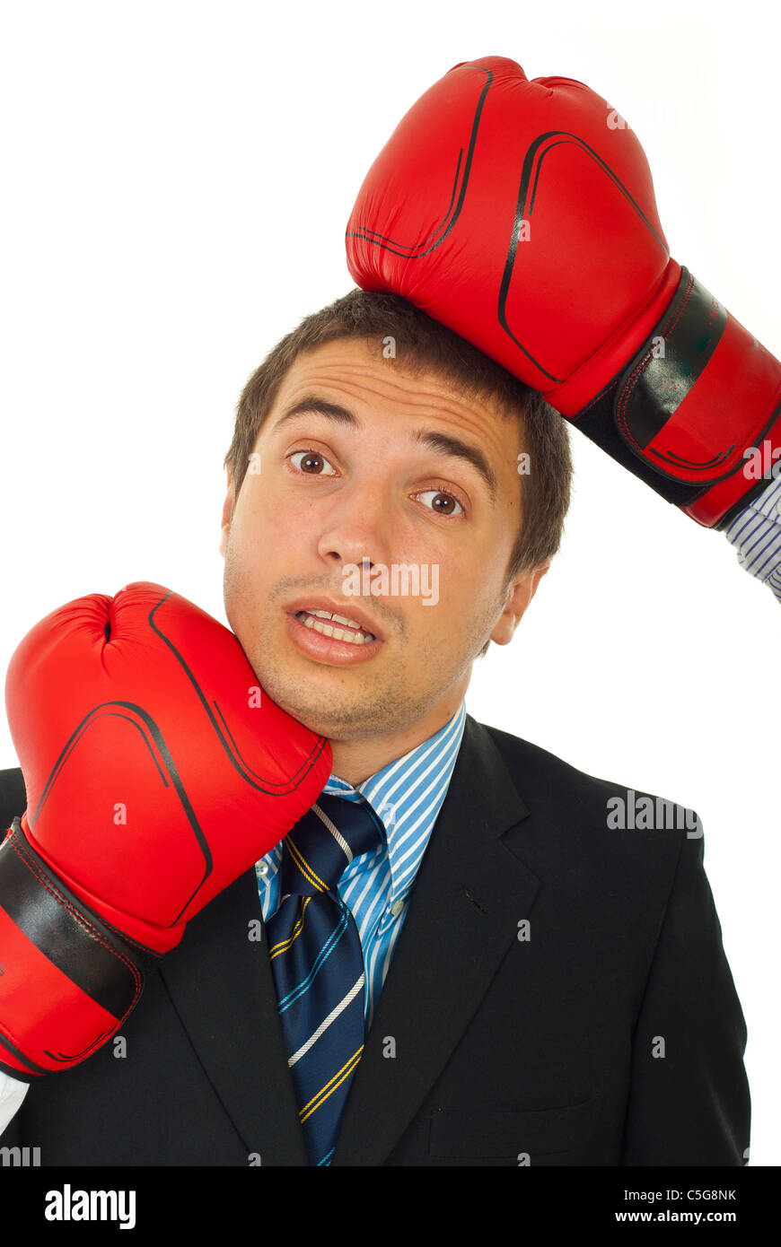 Conceptual image of business man between two boxing gloves under ...