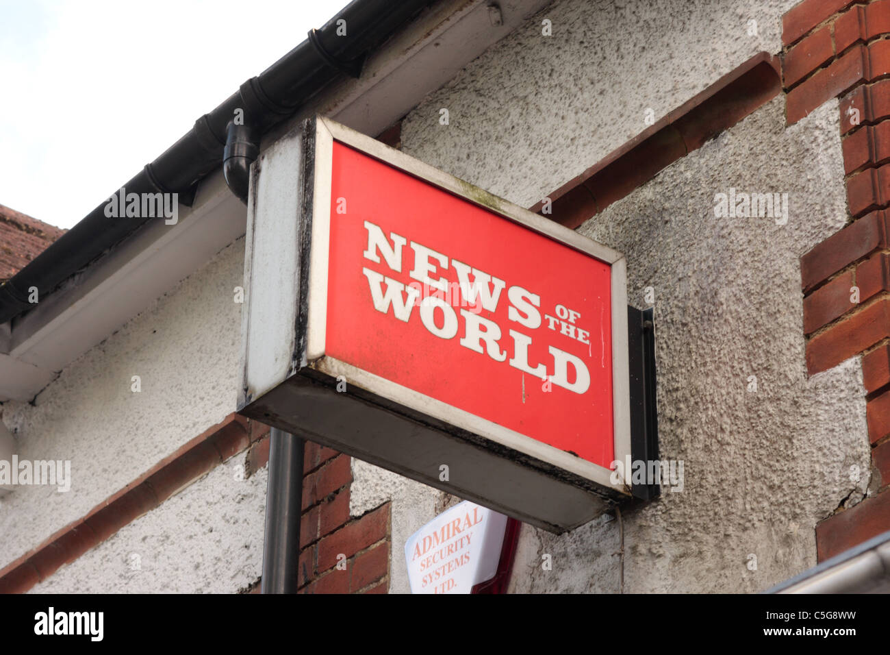 News of The World sign above a newsagent in the UK Stock Photo - Alamy