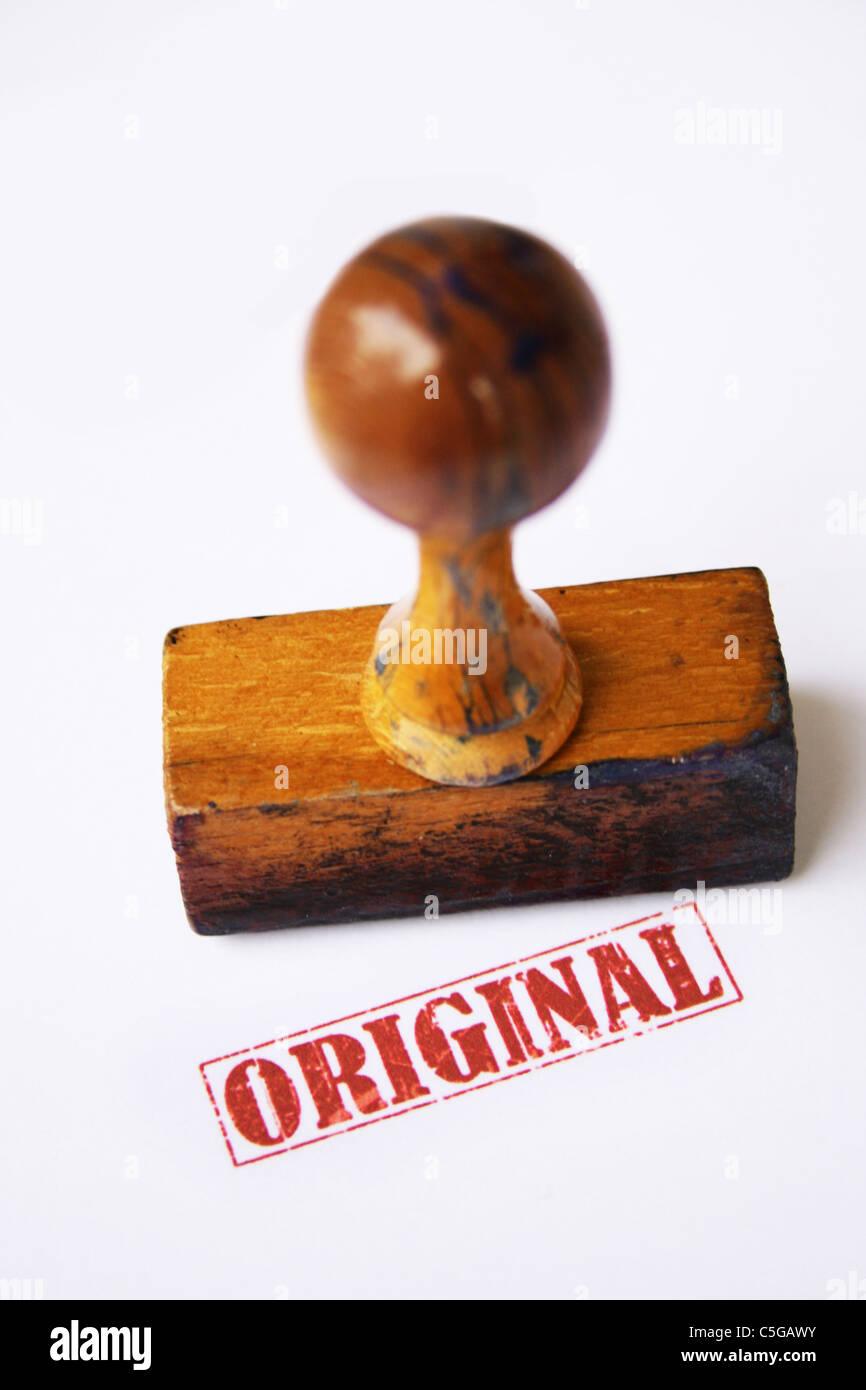 Wooden stamp and original Stock Photo - Alamy