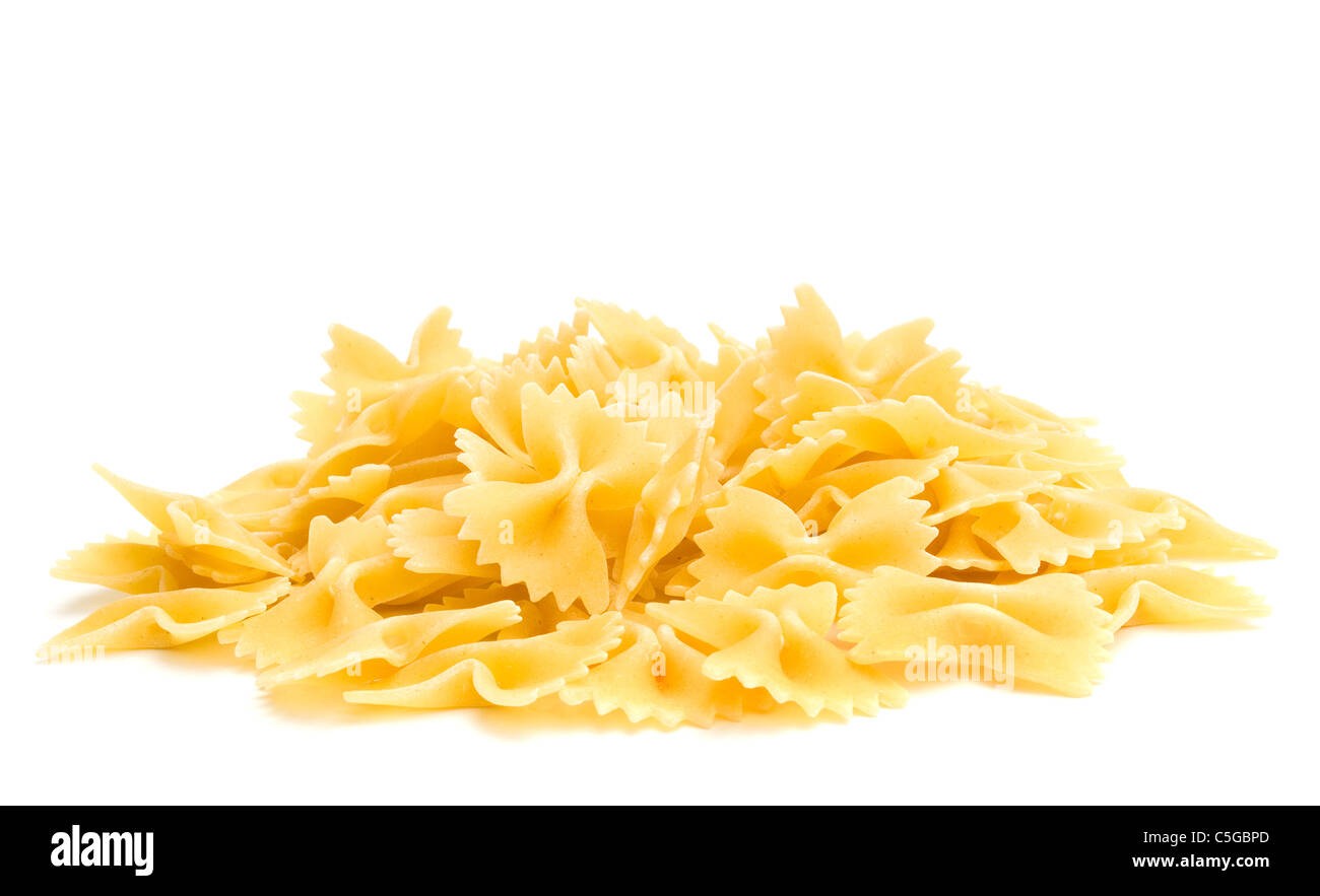 ribbon shaped pasta isolated on white background Stock Photo - Alamy