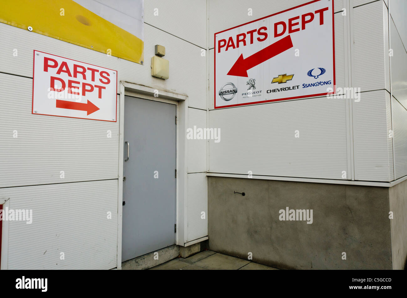 Door of a parts department at a car showroom Stock Photo - Alamy