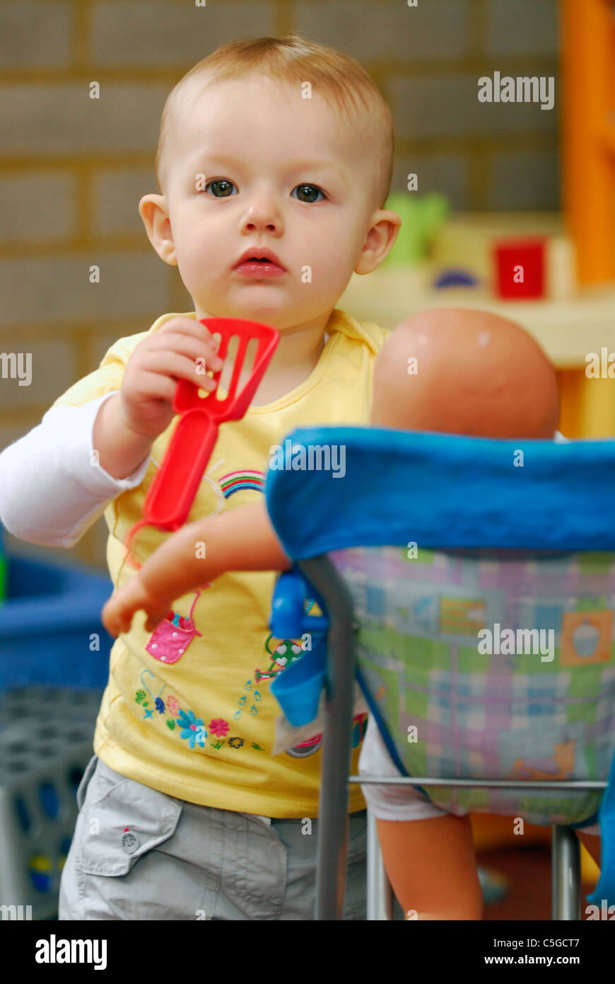 Baby in creche, Surrey, UK Stock Photo - Alamy