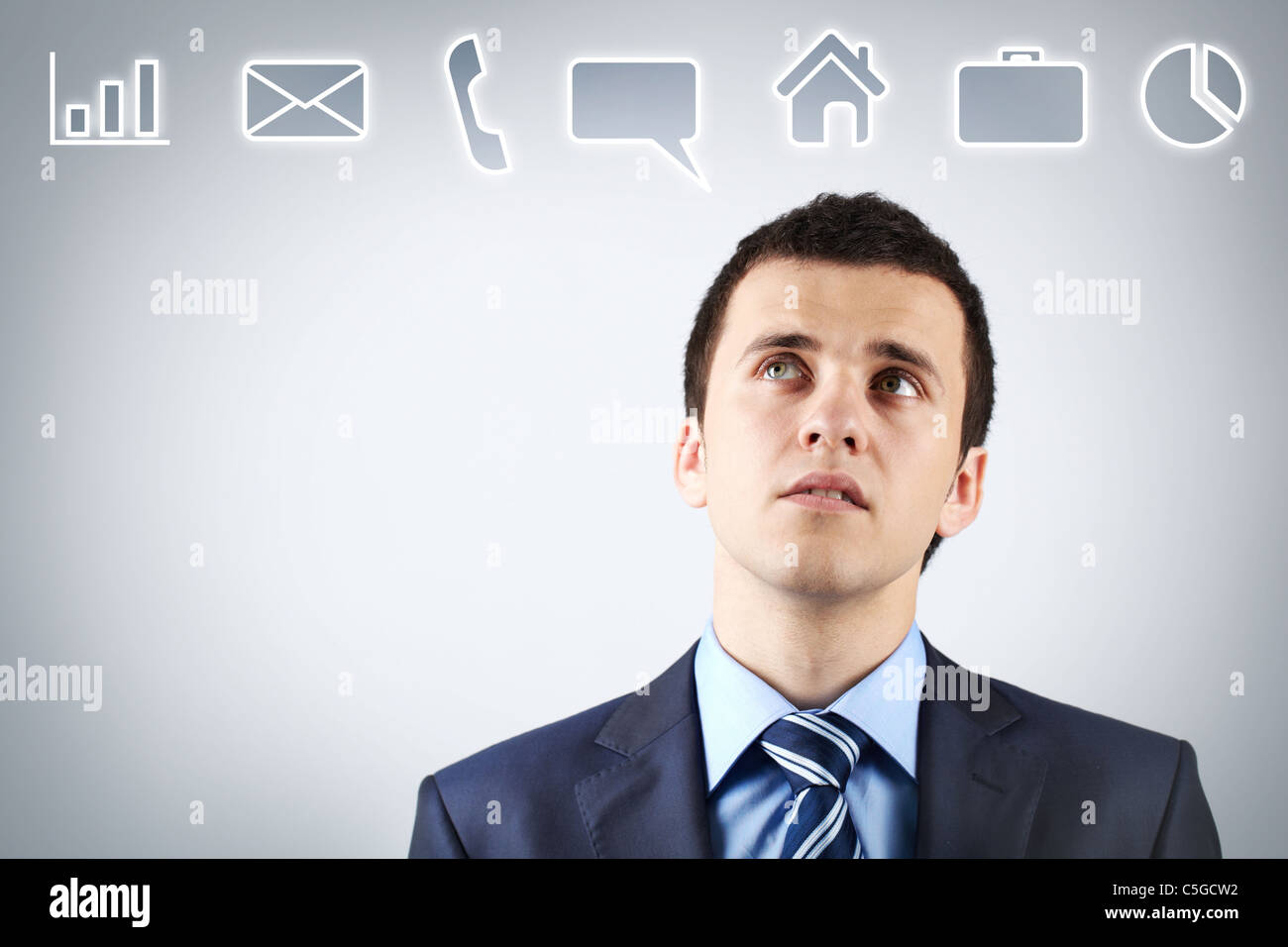 Portrait of pensive man thinking of what to do first Stock Photo - Alamy
