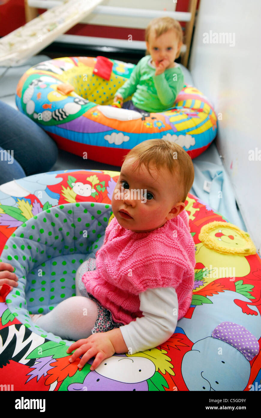 Babies in creche, Surrey, UK Stock Photo - Alamy