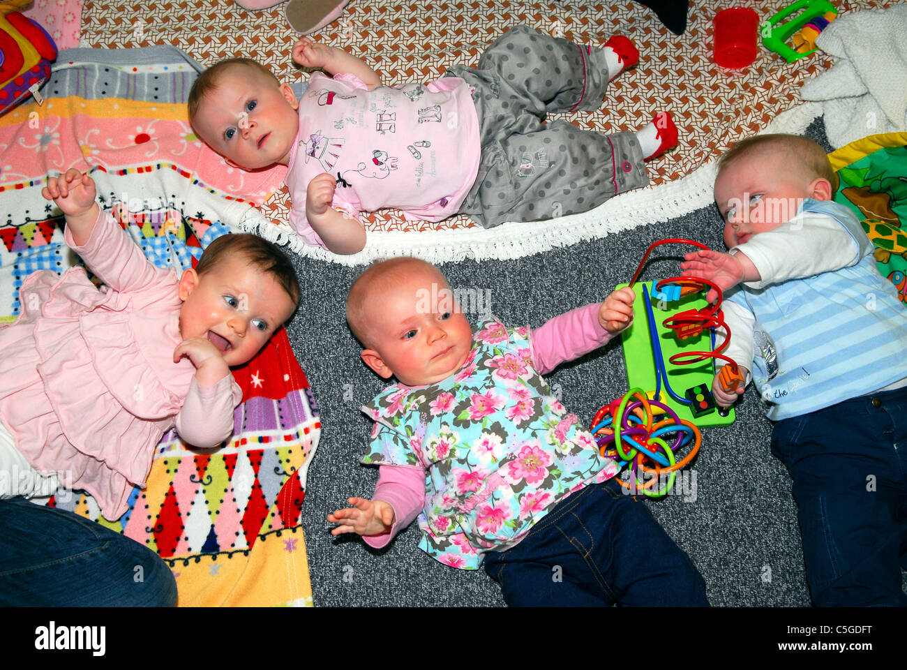 Children playing at creche hi-res stock photography and images - Alamy