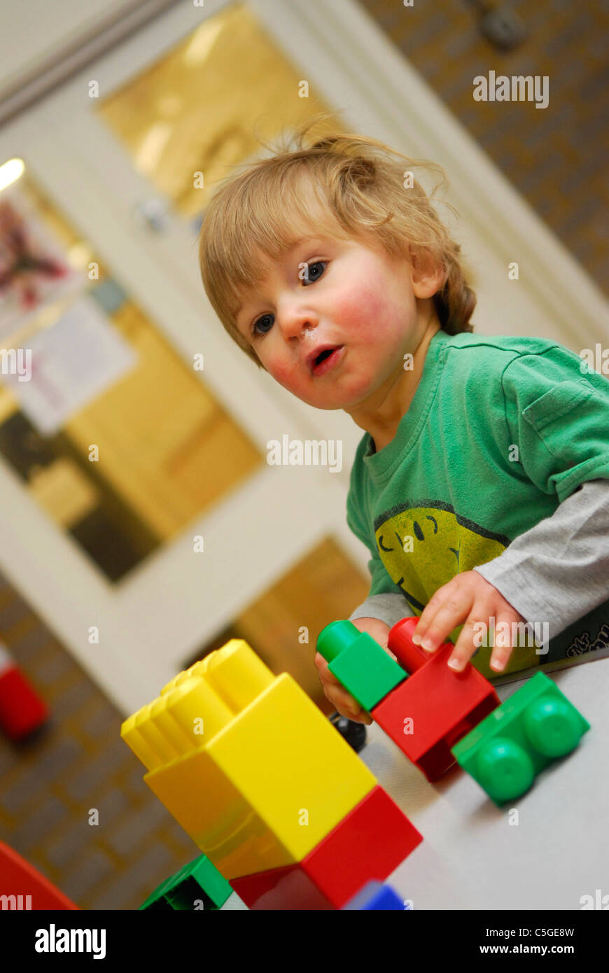 Children playing at creche hi-res stock photography and images - Alamy