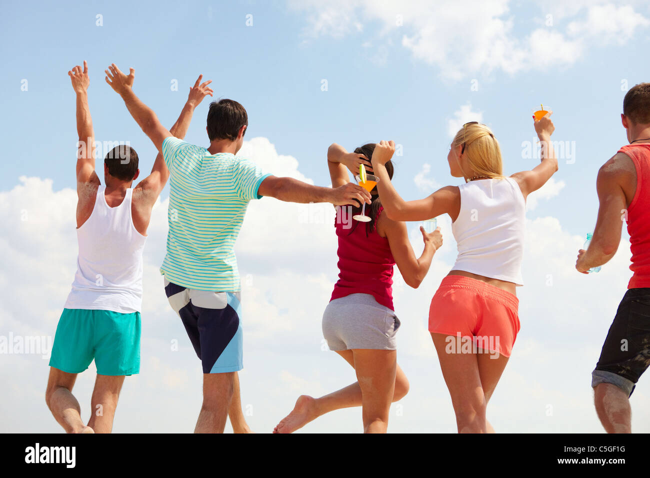 Backs of dancers Stock Photo - Alamy
