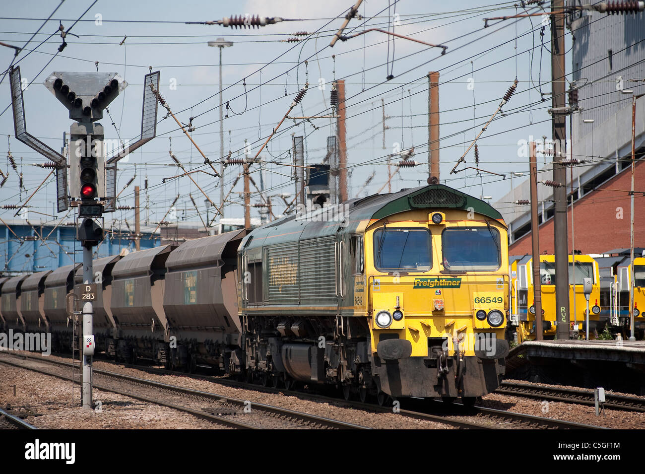 Freightliner freight train travelling along a railway line in England ...