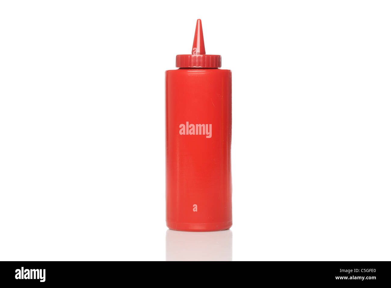 A red ketchup bottle against a white background Stock Photo - Alamy