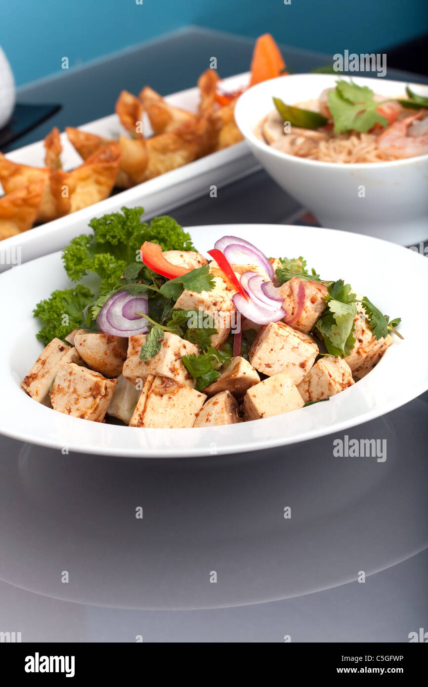 A nice assortment of Thai food and appetizers presented beautifully ...