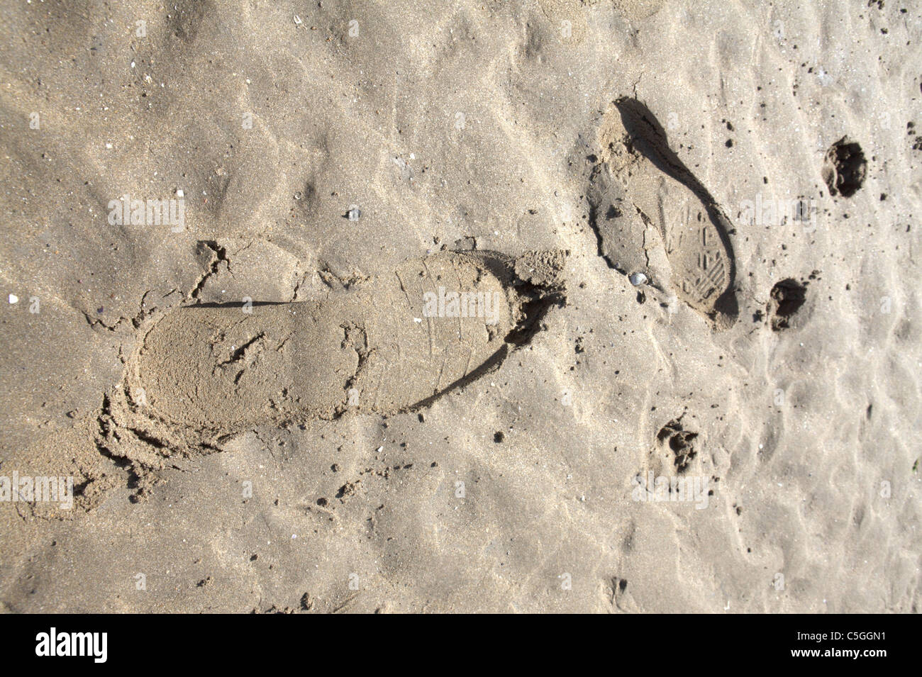 Boot marks in the sand Stock Photo - Alamy