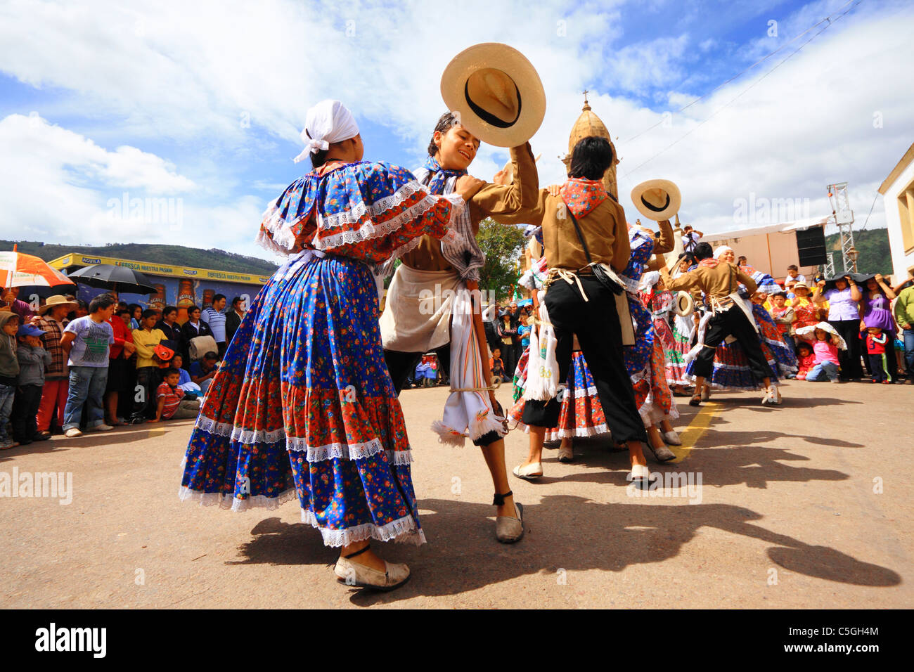 Dancers of Nobsa Dance Group performing outside a traditional dance ...