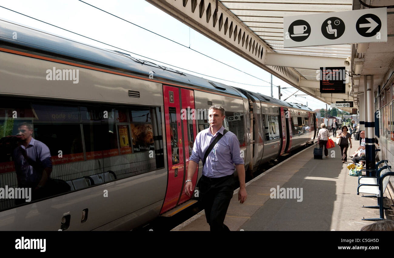 Passengers leaving a Crosscountry train having just arrived at a ...
