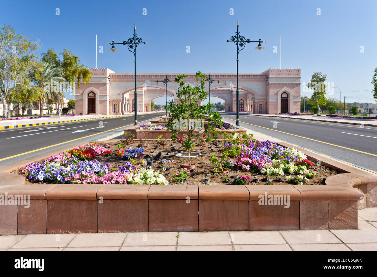 An arched gate on a freeway in rural Sultanate of Oman Stock Photo - Alamy