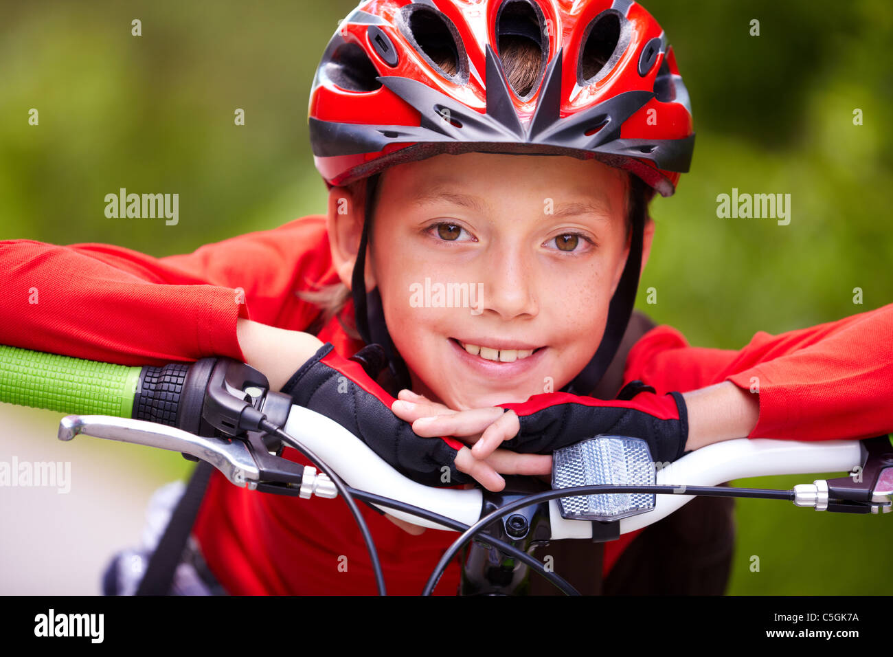 Cyclist face boy smiling hi-res stock photography and images - Alamy