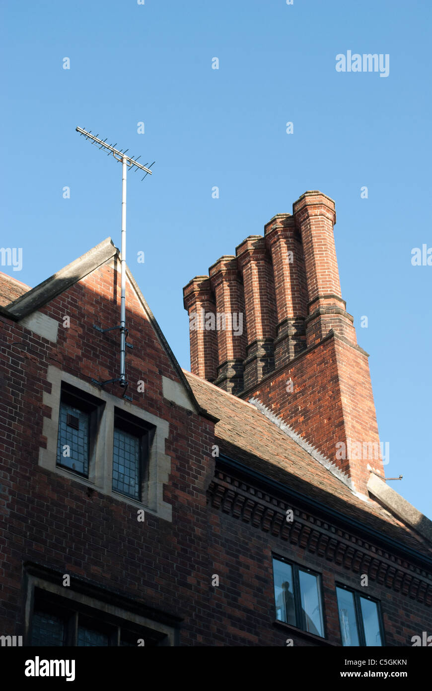 Row of brick chimneys on building in Cambridge Stock Photo - Alamy