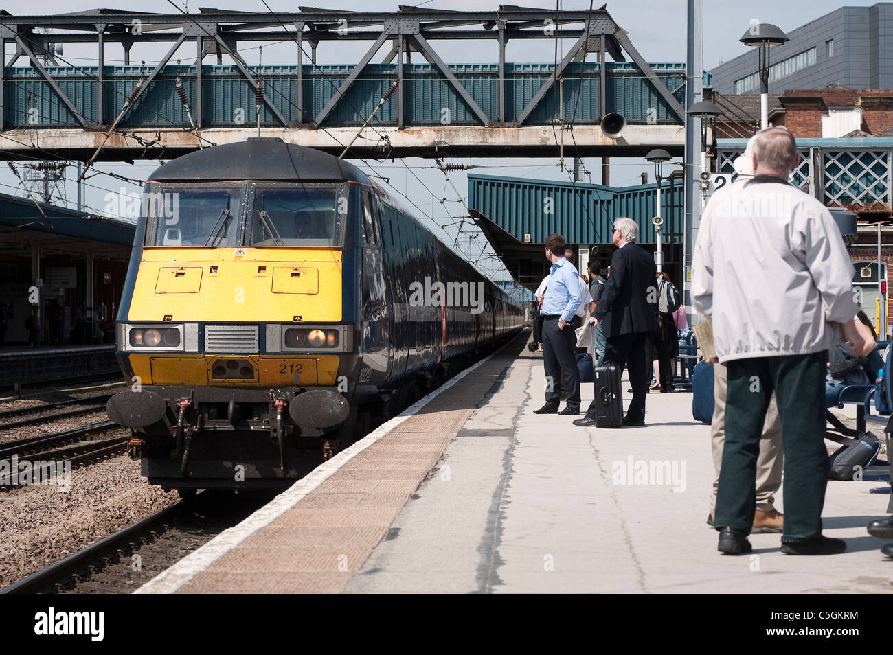 Passenger wait to board high speed train on platform hi-res stock ...
