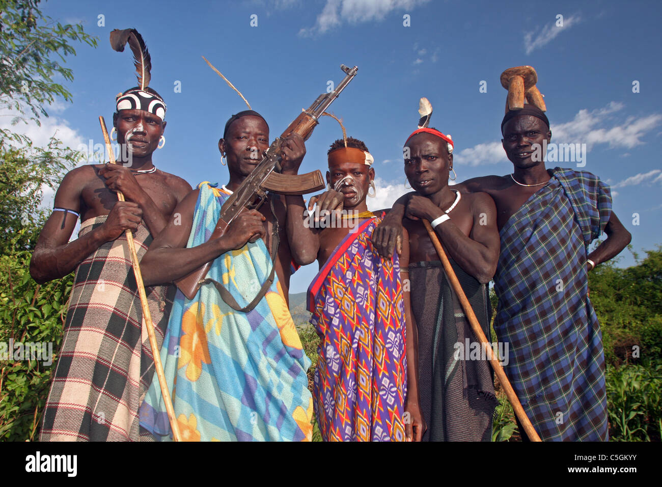 Surma men with riffles, west of Omo River Ethiopia Stock Photo - Alamy
