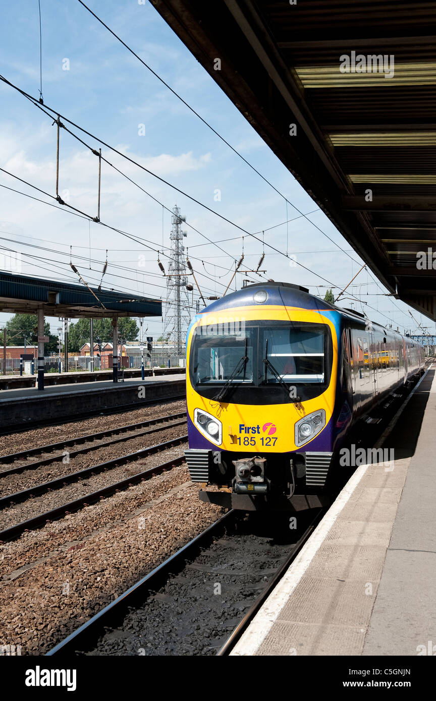 Class 185 train in First Transpennine livery waiting at a railway ...