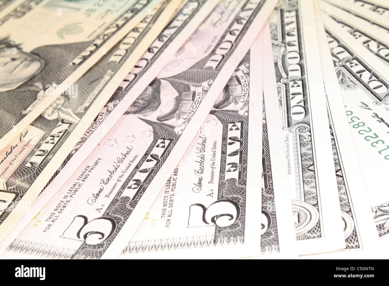 a stack of many colorful dollar notes Stock Photo - Alamy