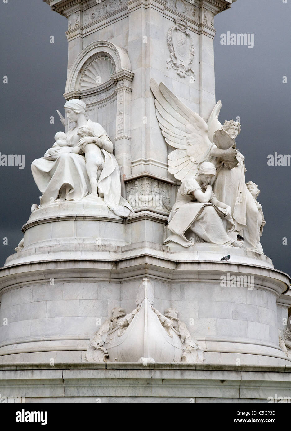 Central plinth of the Victoria Memorial in London with sculpted white ...