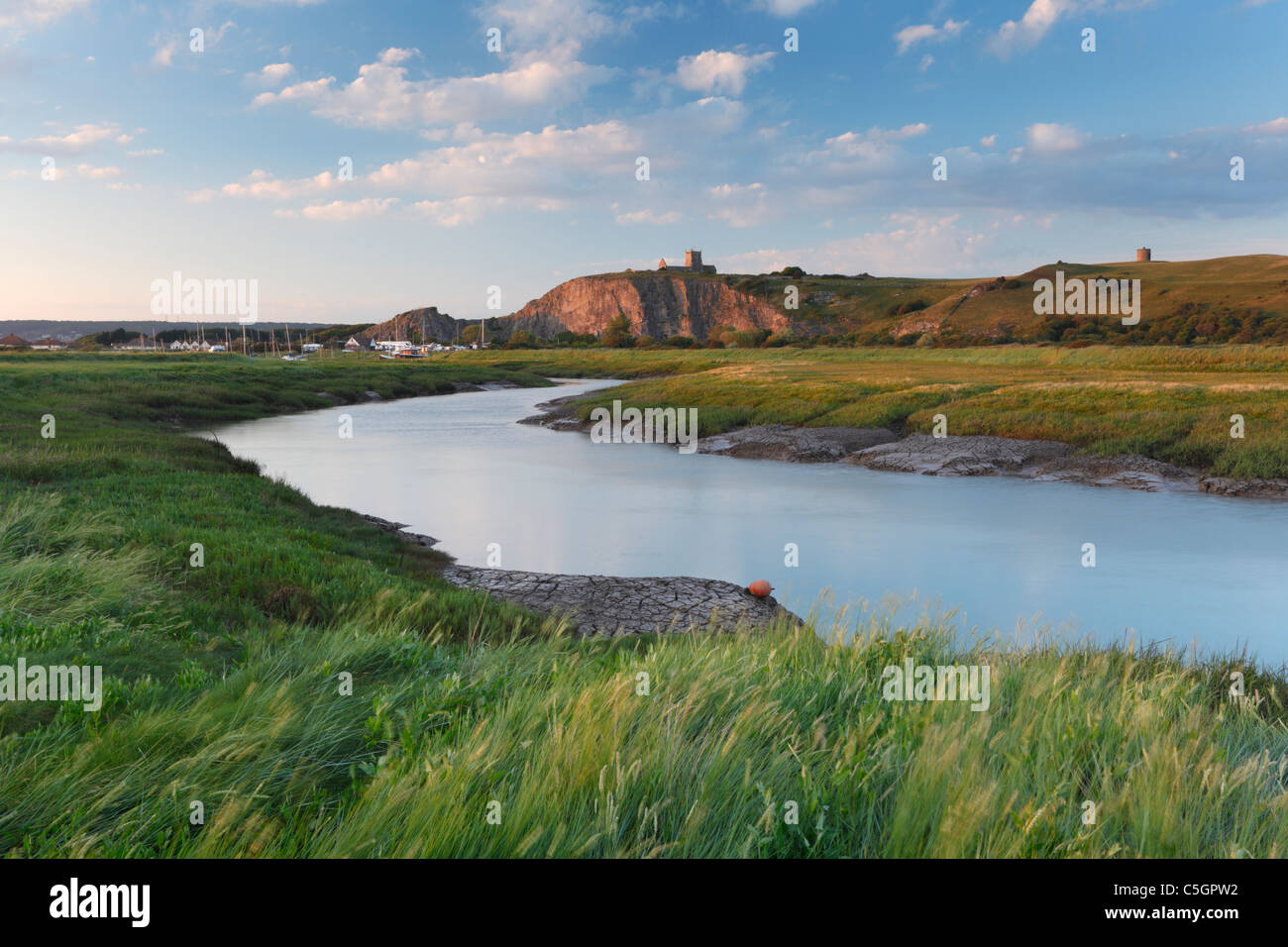 River Axe at Uphill with the Old Church on the Hilltop. Somerset ...