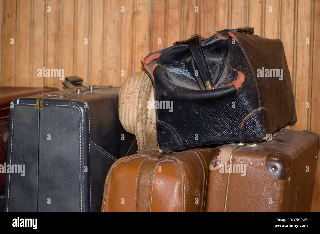 Stack of old luggage at the station Stock Photo - Alamy