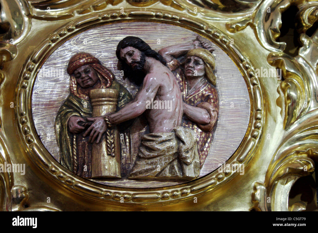 A sculpture of Jesus Christ tied to a column and whipped by Jews in ...