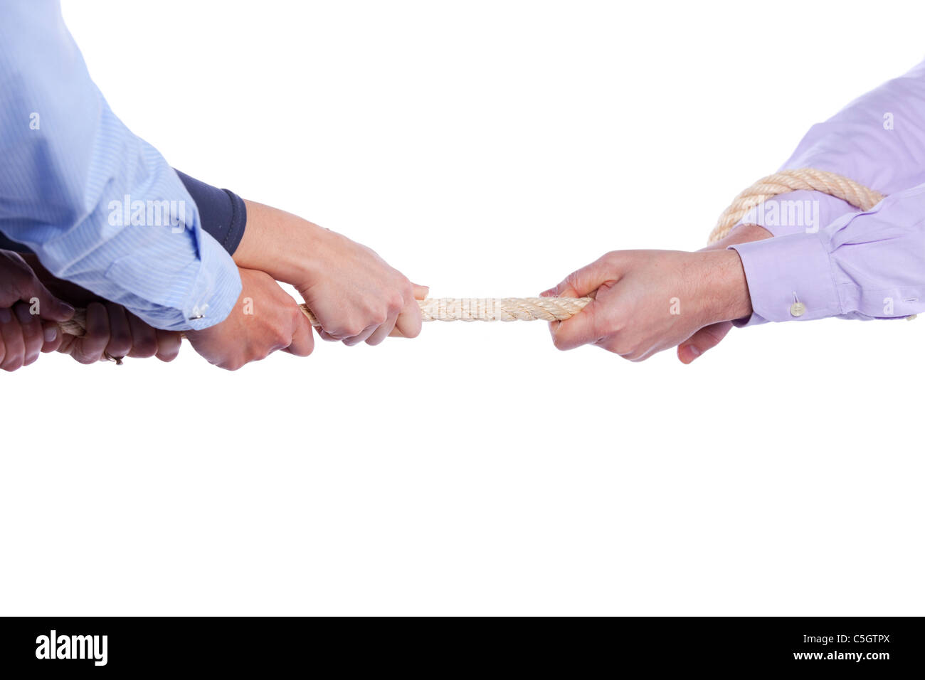 Group of woman hands pulling a rope competing with a man (selective ...