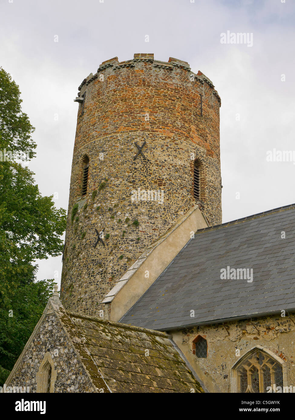 Detail of the circular Saxon tower on the church of St Peter and St ...
