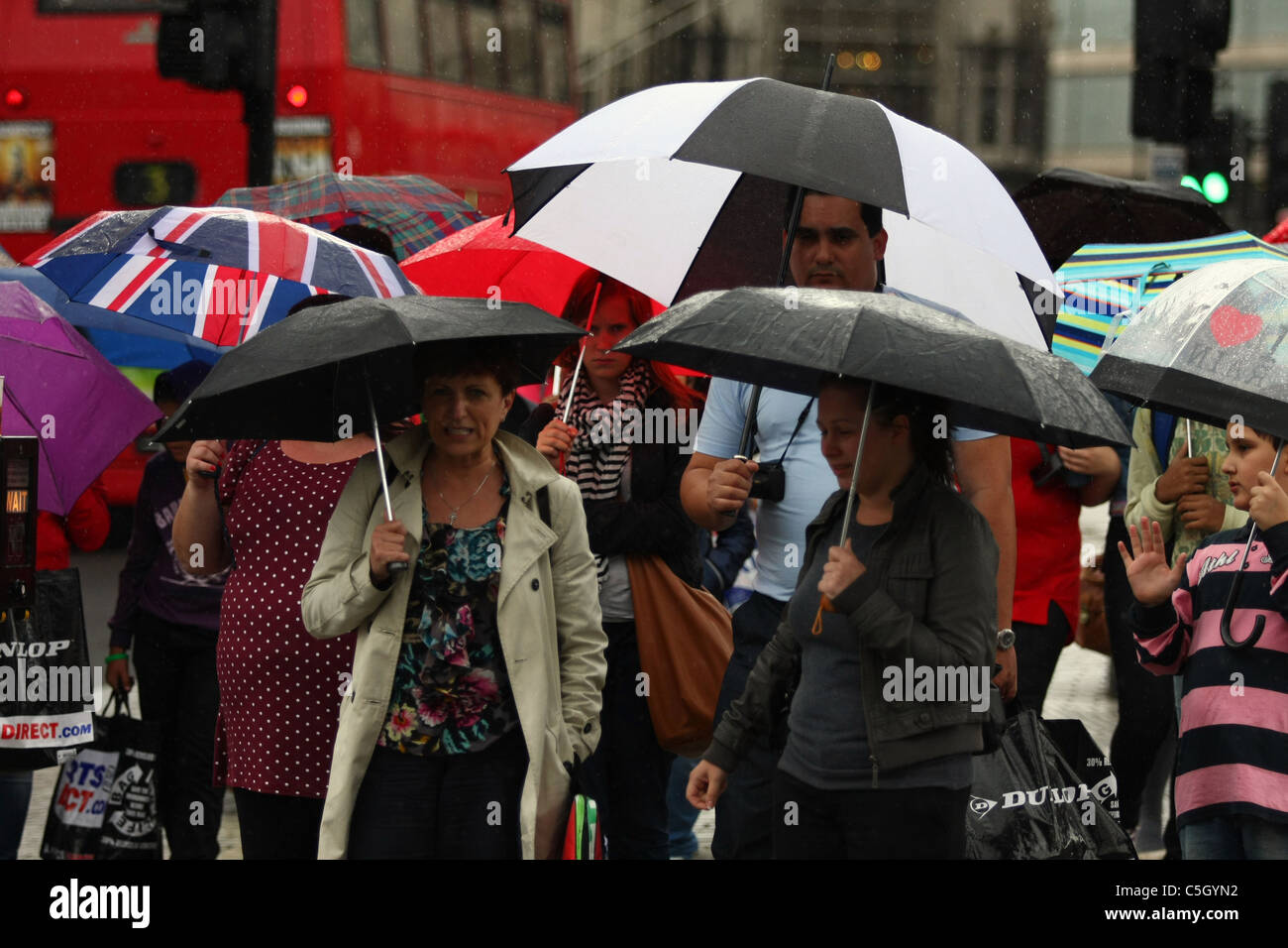 Group people sheltering hi-res stock photography and images - Alamy
