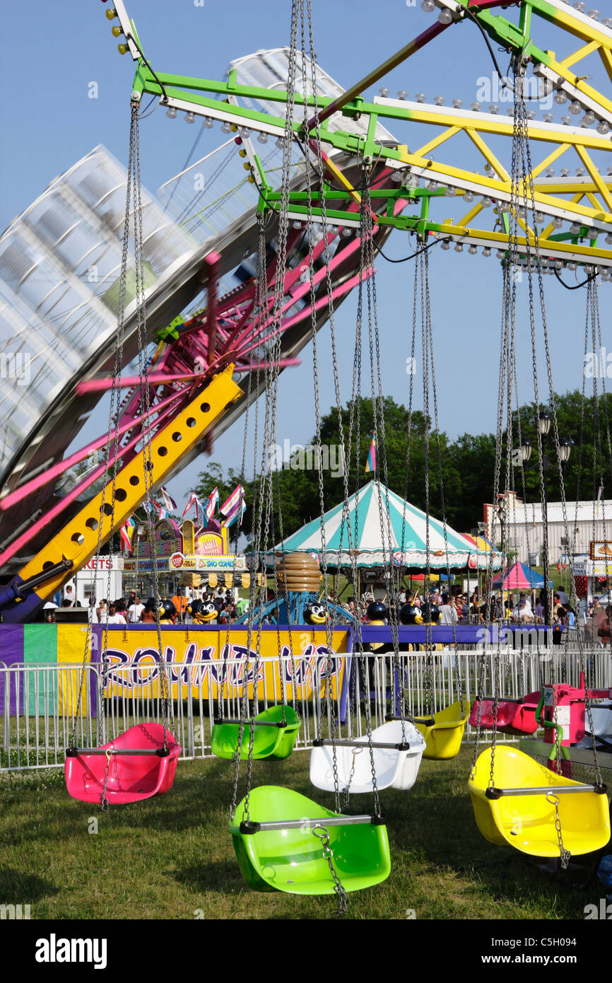 Colourful carnival rides hi-res stock photography and images - Alamy