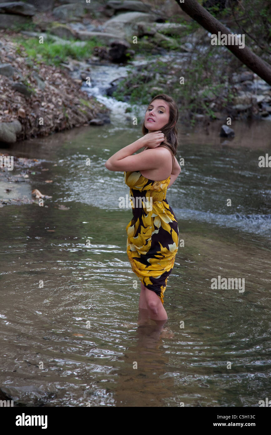 Woman wading in water in a dress hi-res stock photography and images ...